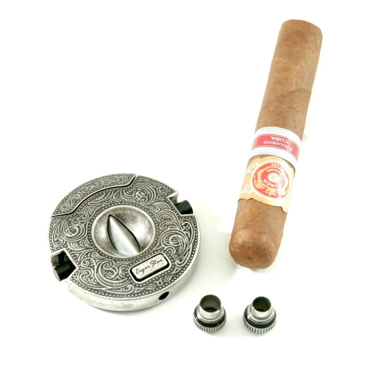 Revo Cigar Star V cut cigar cutter with dual built in cigar punches.